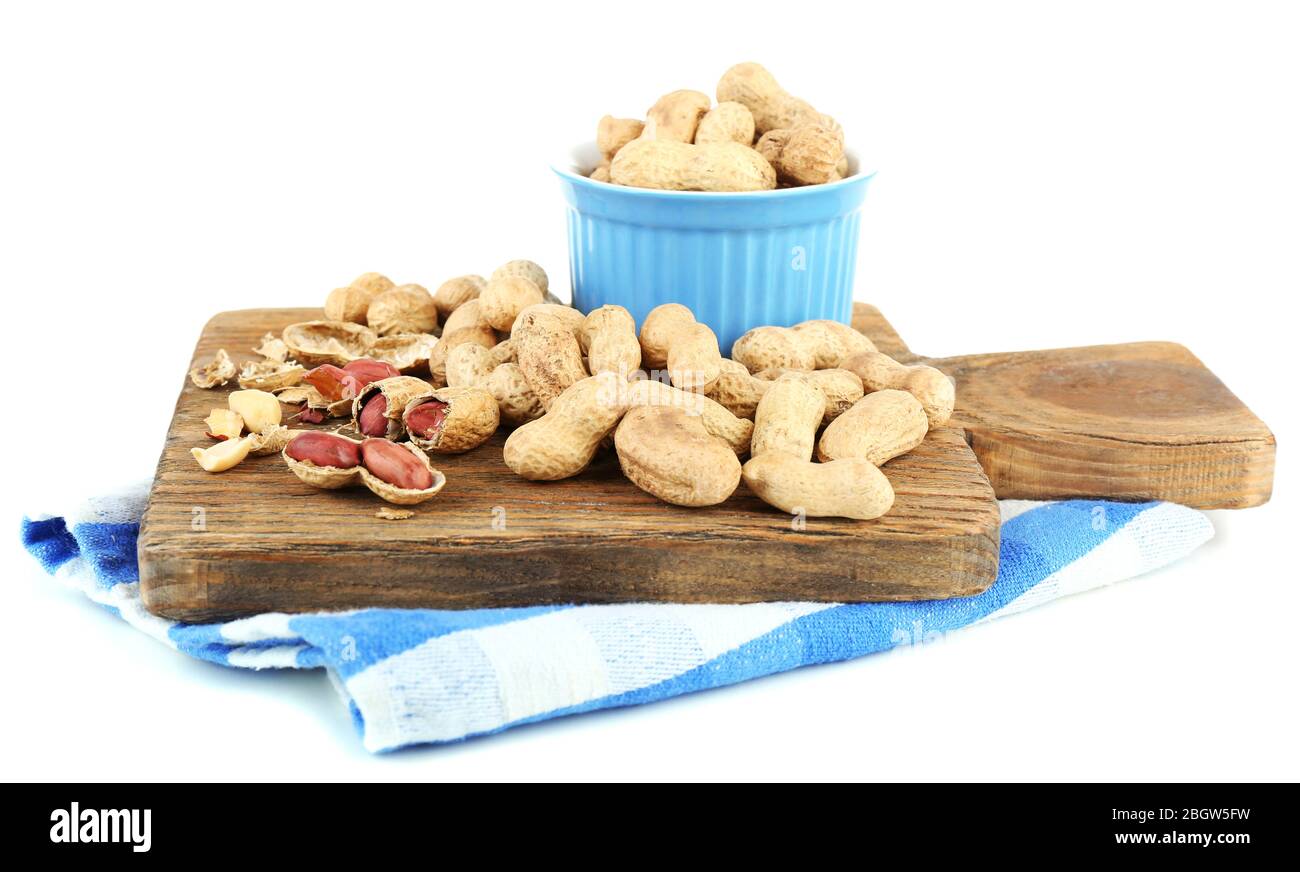 Peanuts cutting board, isolated on white background Stock Photo - Alamy