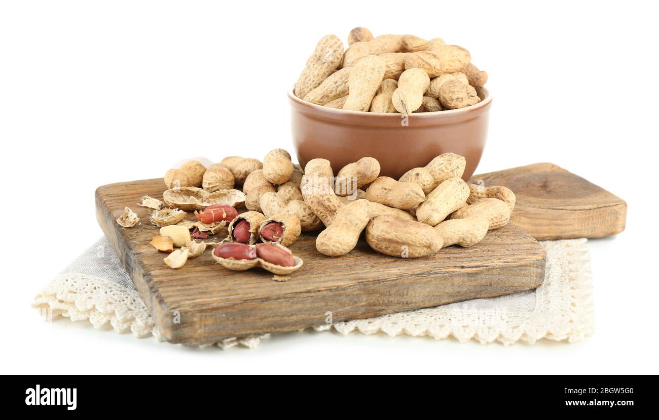 Peanuts cutting board, isolated on white background Stock Photo - Alamy