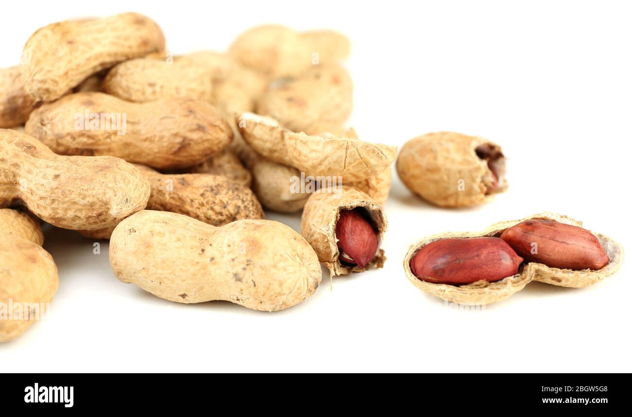 Peanuts isolated on white background Stock Photo - Alamy