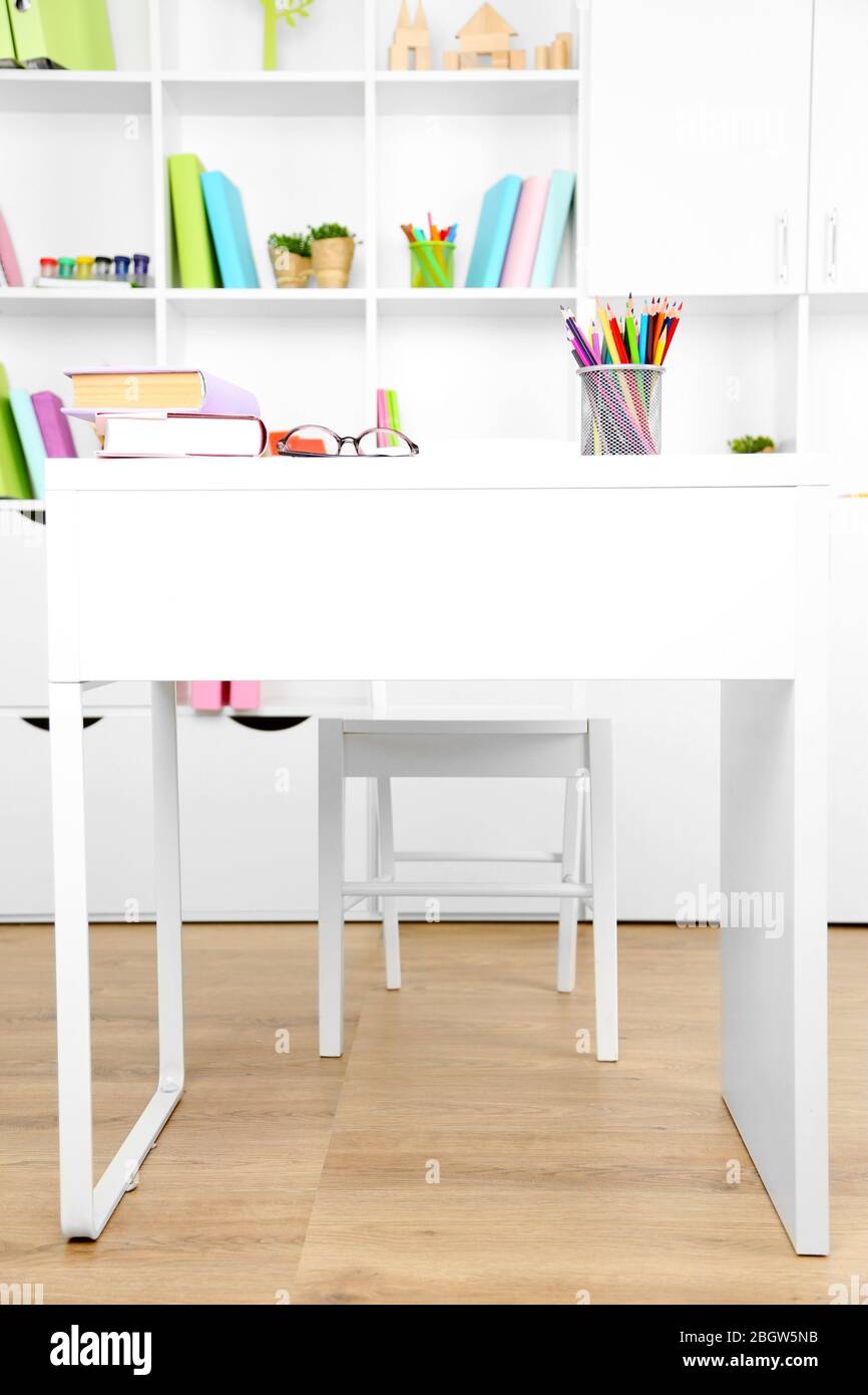 Workplace in classroom Stock Photo - Alamy