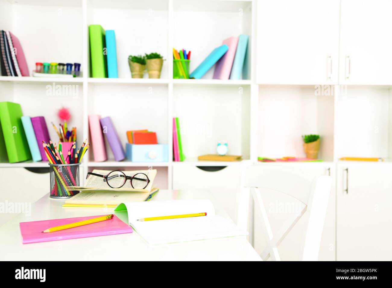 Workplace in classroom Stock Photo - Alamy