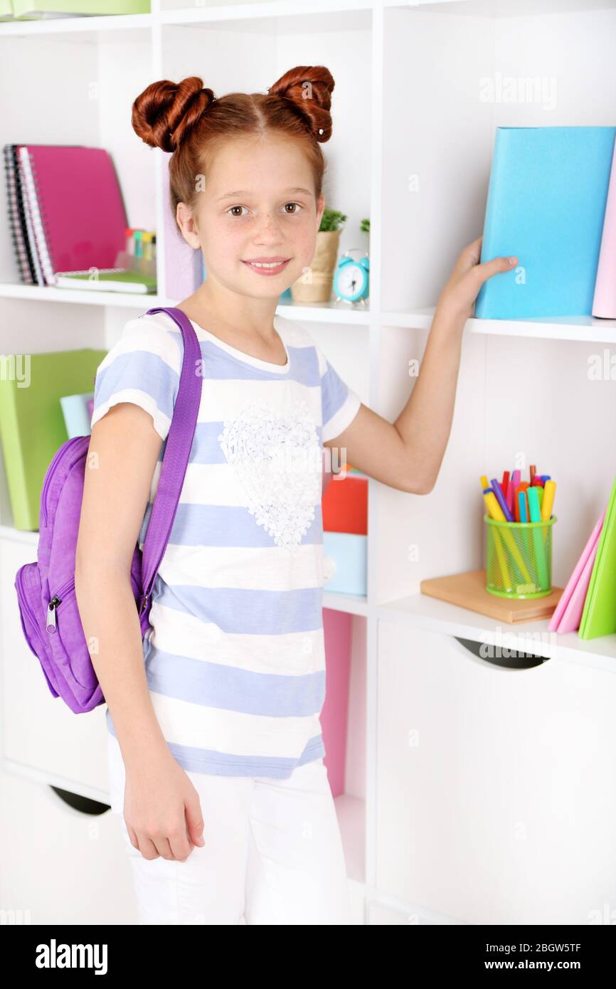 Cute girl in classroom Stock Photo - Alamy