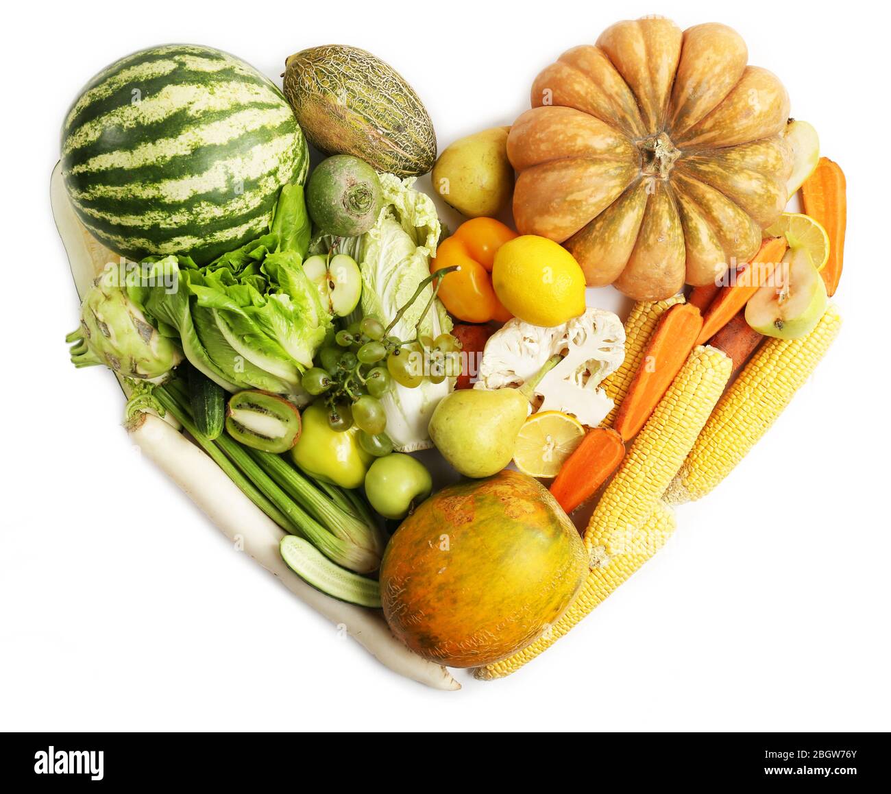 Fresh organic vegetables in shape of heart, isolated on white Stock ...
