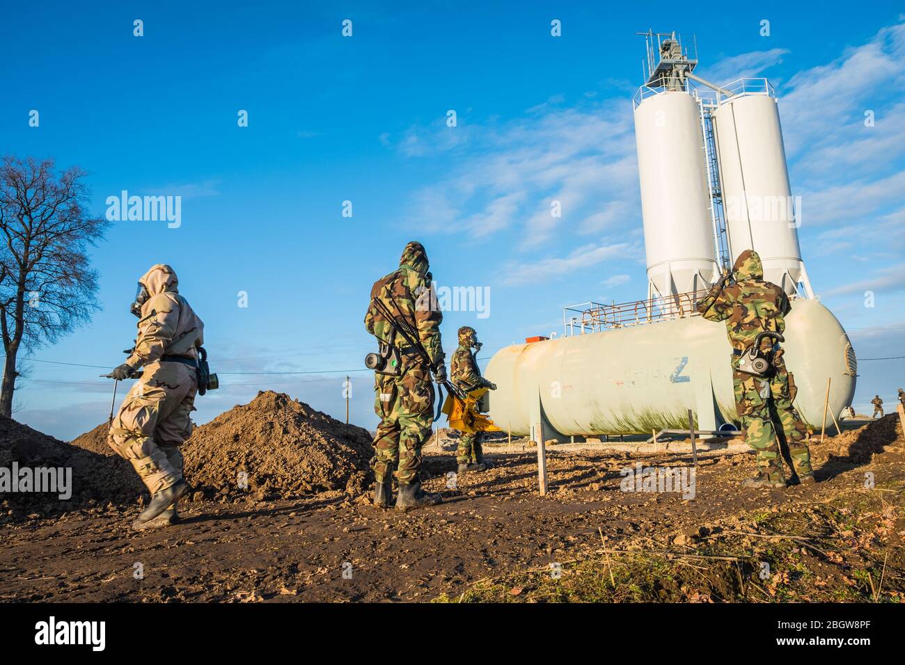 TOULOUSE, FRANCE - FEBRUARY 10: soldiers with gas masks during a ...