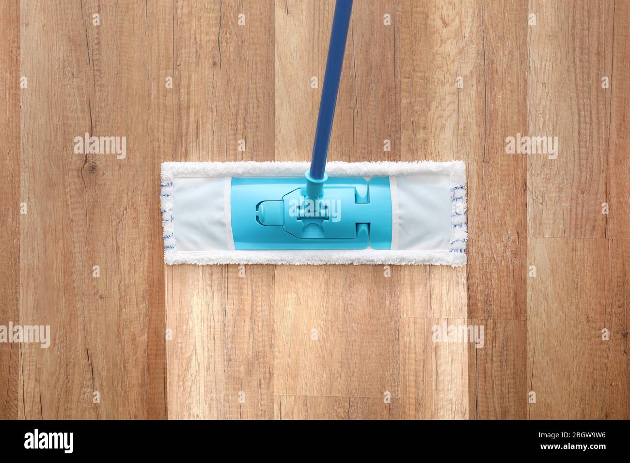 Cleaning of floor with mop Stock Photo - Alamy