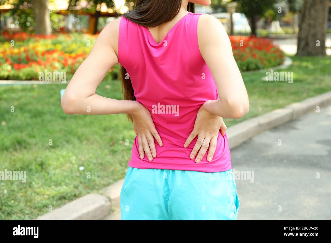 Sports injuries of girl outdoors Stock Photo - Alamy