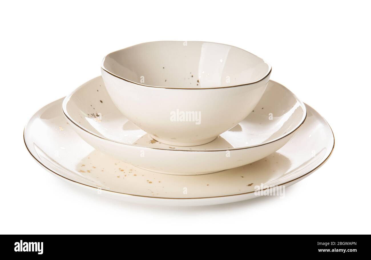 Clean plates on white background Stock Photo - Alamy