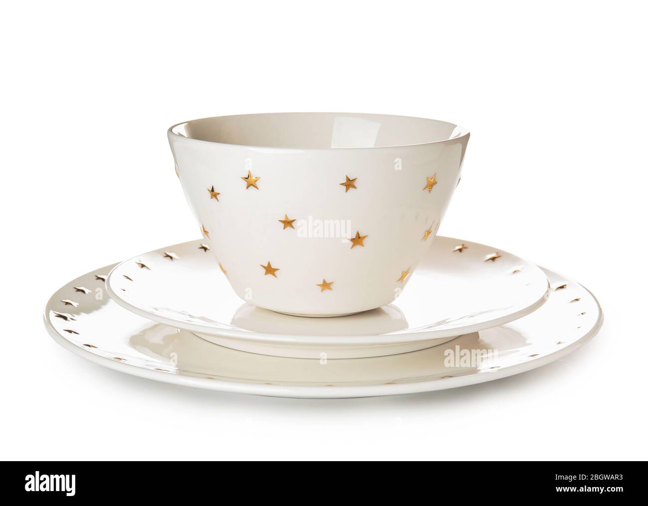 Clean plates on white background Stock Photo - Alamy