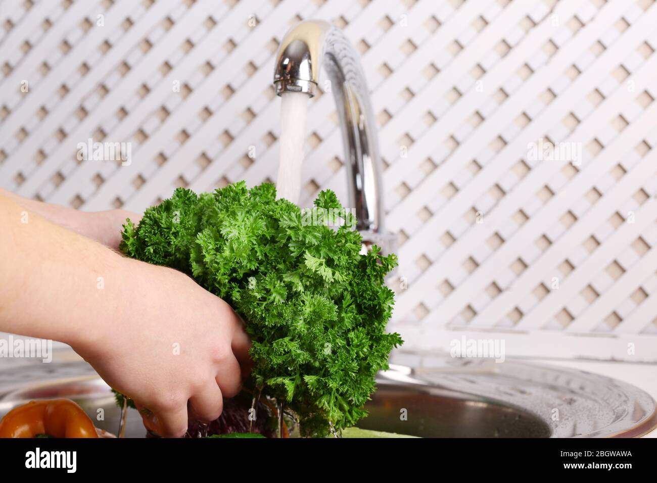 Washing vegetables, close-up Stock Photo - Alamy