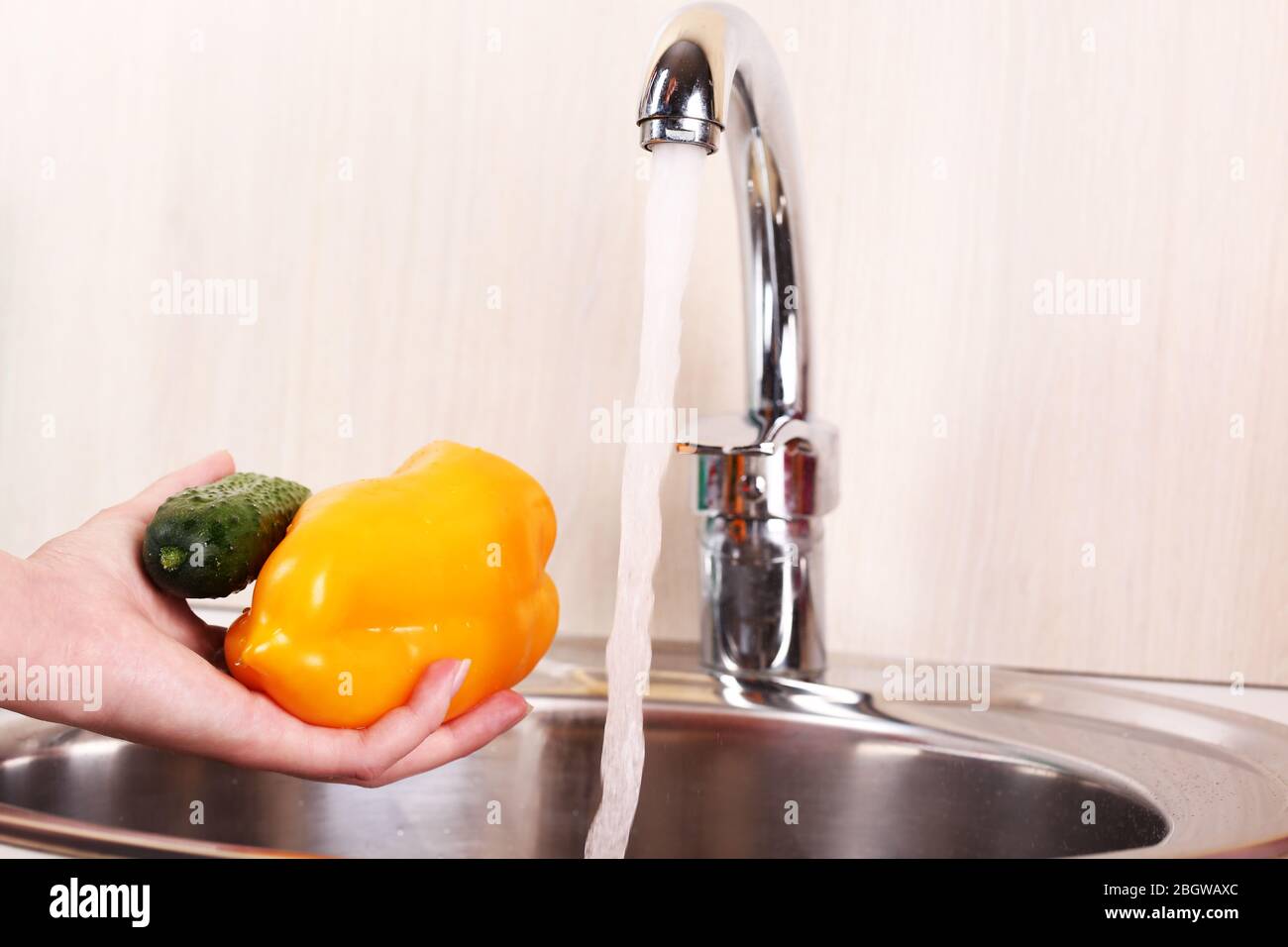 Woman washing various vegetables hi-res stock photography and images ...