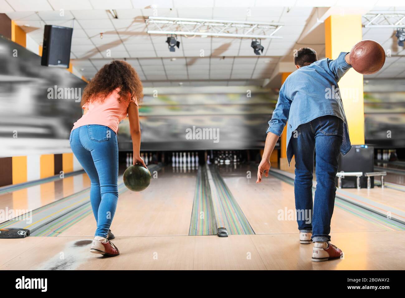 Young woman bowling back view hi-res stock photography and images - Alamy