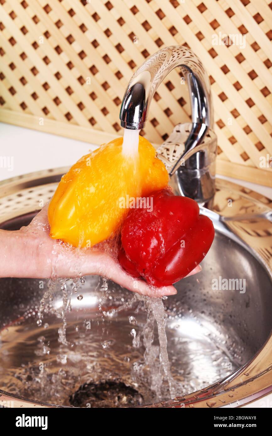 Woman washing various vegetables hi-res stock photography and images ...
