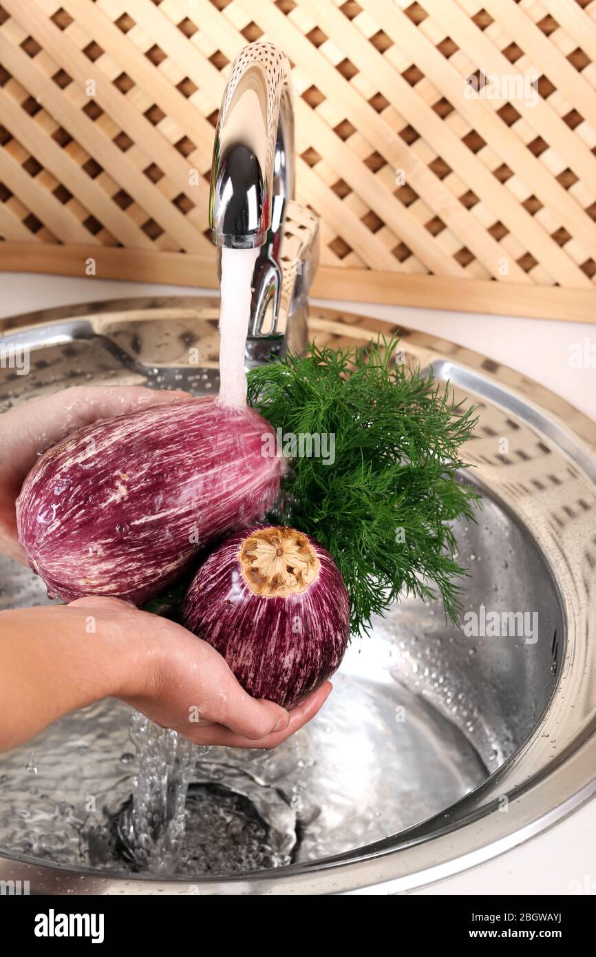 Woman washing different vegetables hi-res stock photography and images ...