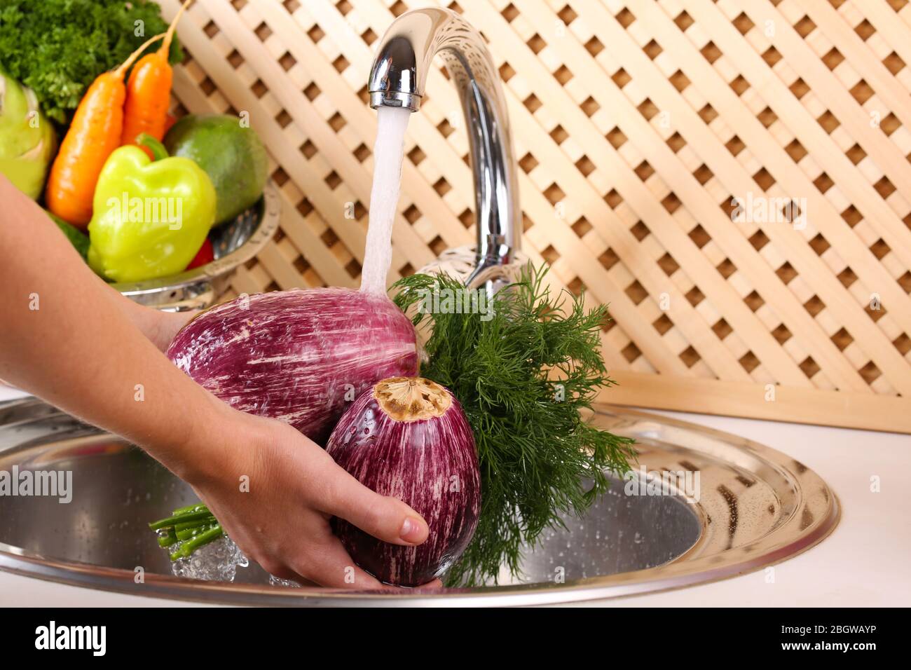 Washing vegetables, close-up Stock Photo - Alamy