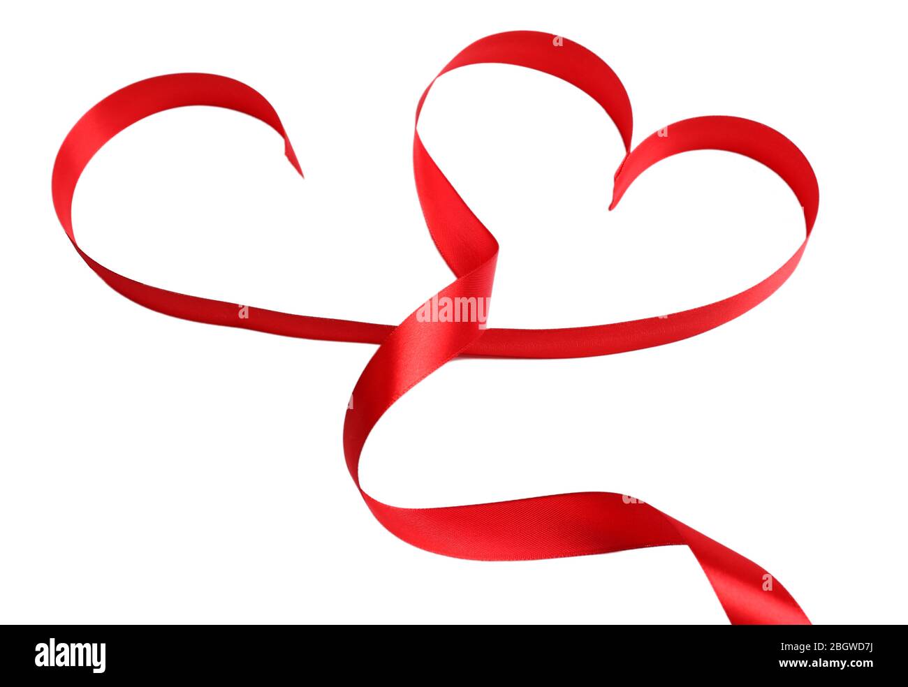 Heart shaped shiny red satin ribbon isolated on white Stock Photo - Alamy