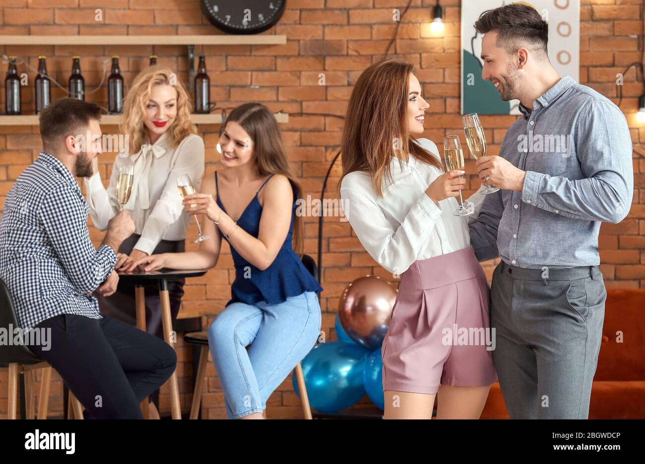 Young people having party at home Stock Photo - Alamy