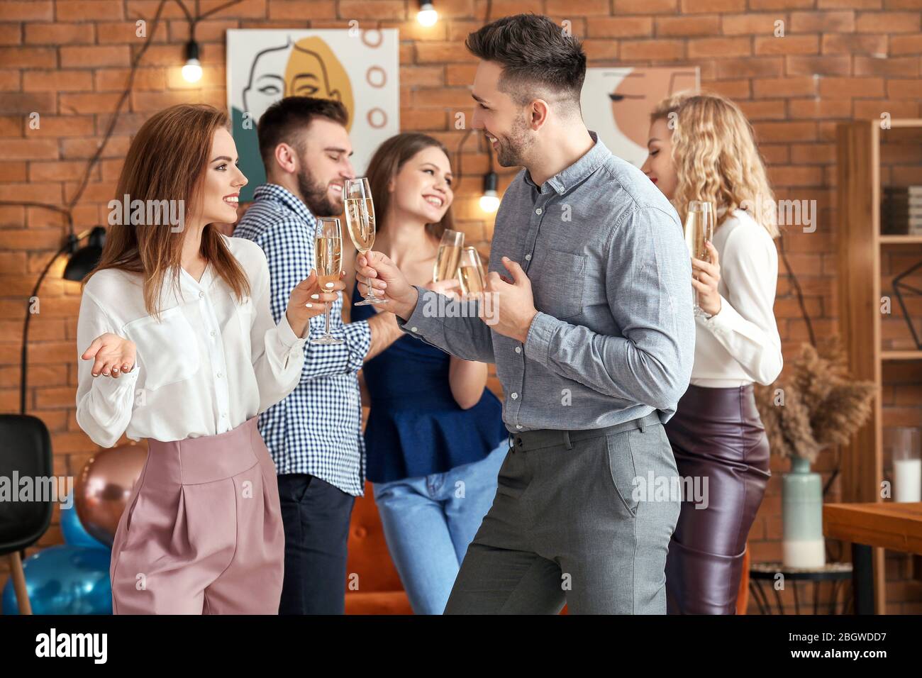 Young people having party at home Stock Photo - Alamy