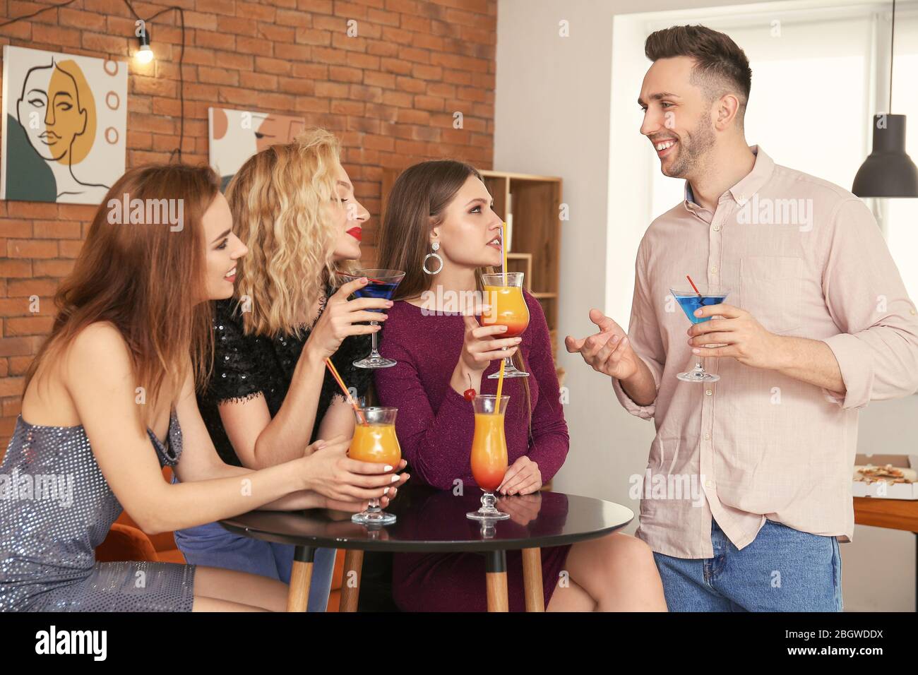 Young people having party at home Stock Photo - Alamy