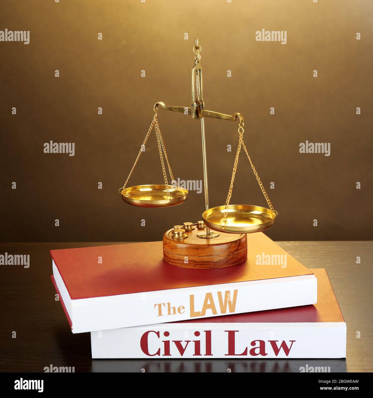 Books of Law on table on dark background Stock Photo - Alamy