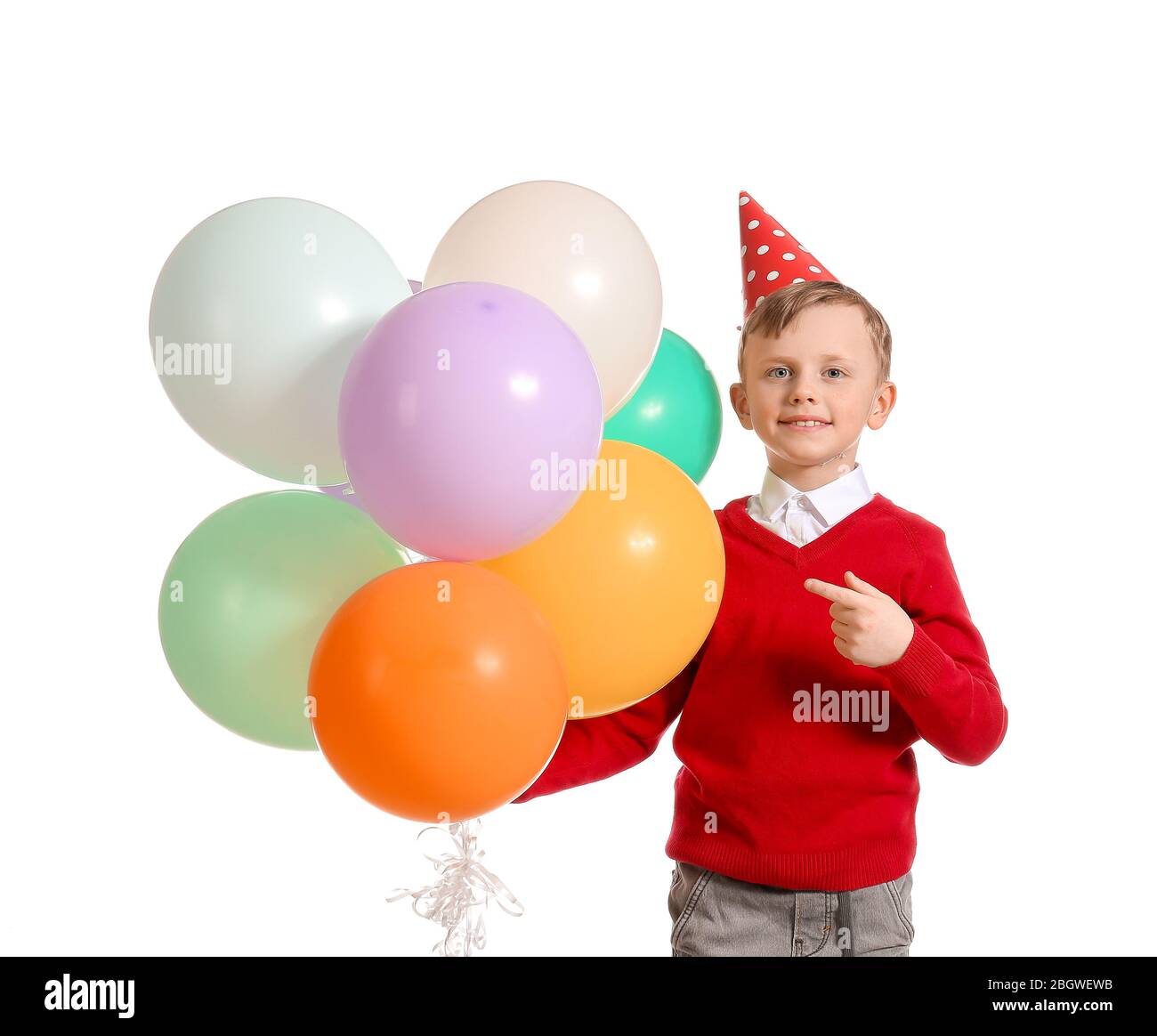 Cute little boy celebrating Birthday on white background Stock Photo ...