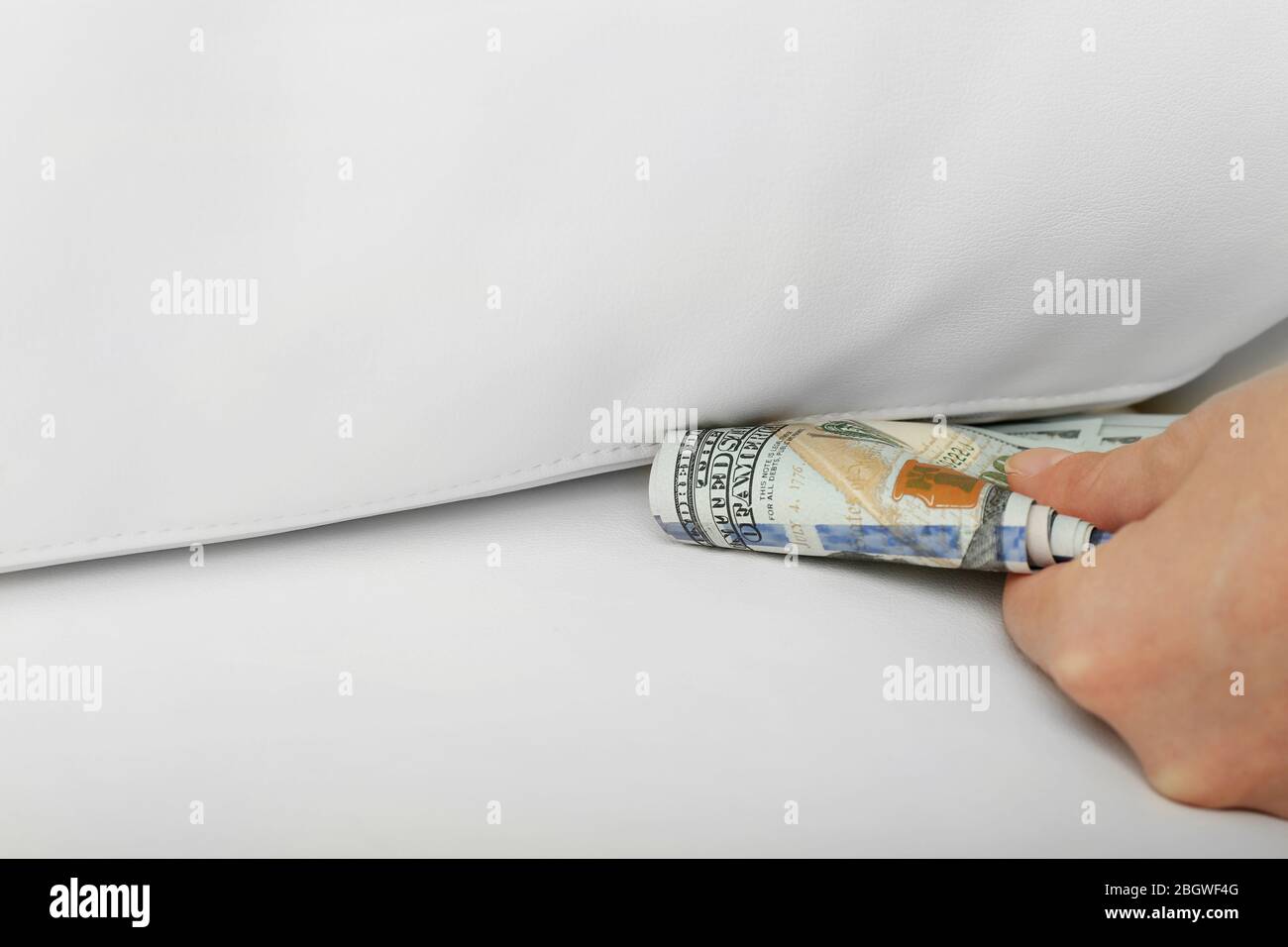 Woman hand under pillow hi-res stock photography and images - Alamy