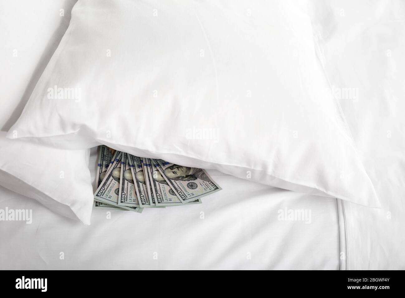Money under pillow hi-res stock photography and images - Alamy
