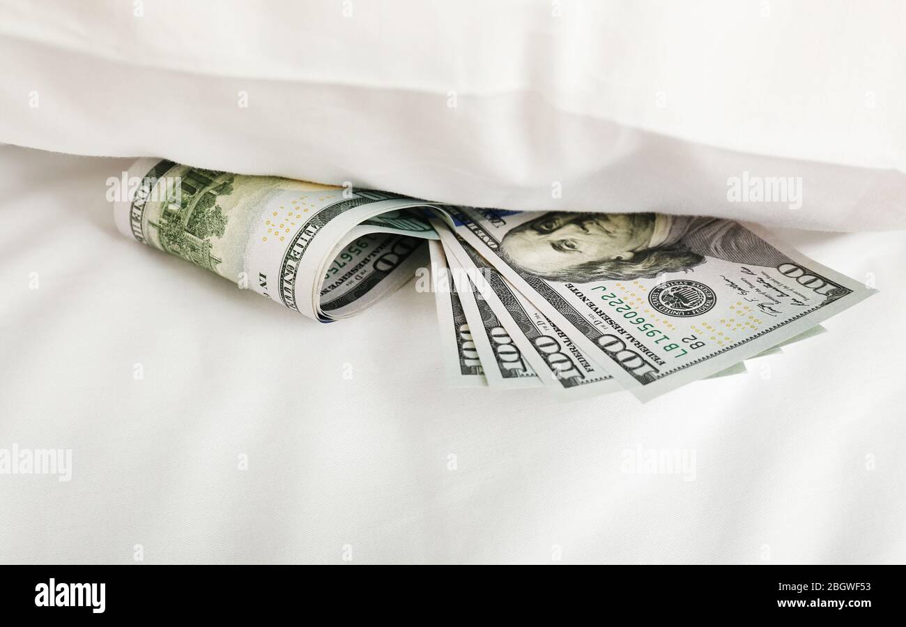 Money under pillow hi-res stock photography and images - Alamy