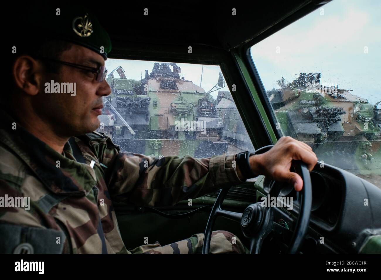 TAPA, ESTONIA - AUGUST 21: French soldier driving in Tapa army base ...