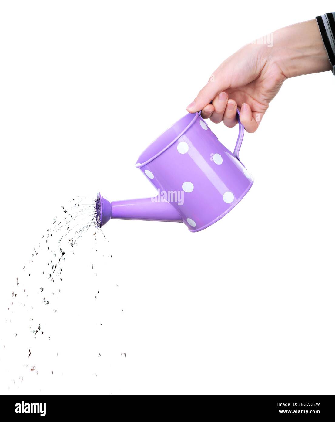 Water pouring from watering can isolated on white Stock Photo - Alamy