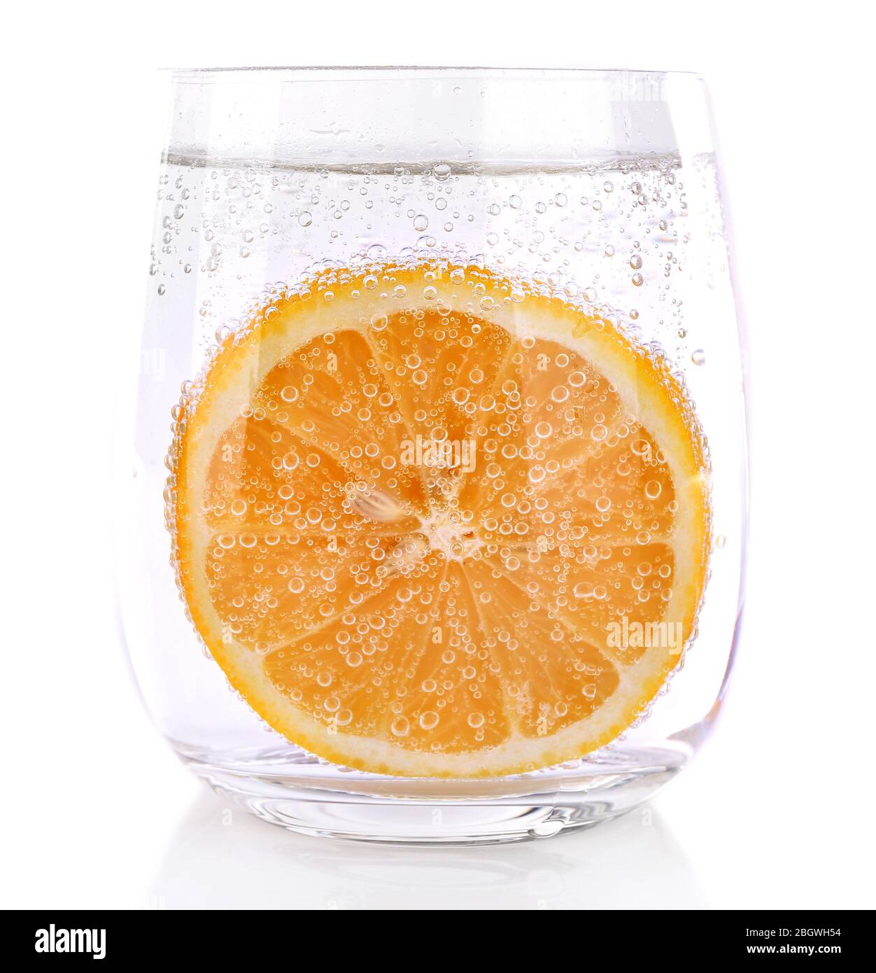 Lemon in glass of water isolated on white Stock Photo - Alamy