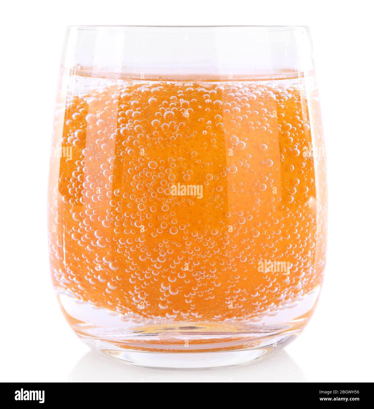 Orange in glass of water isolated on white Stock Photo - Alamy