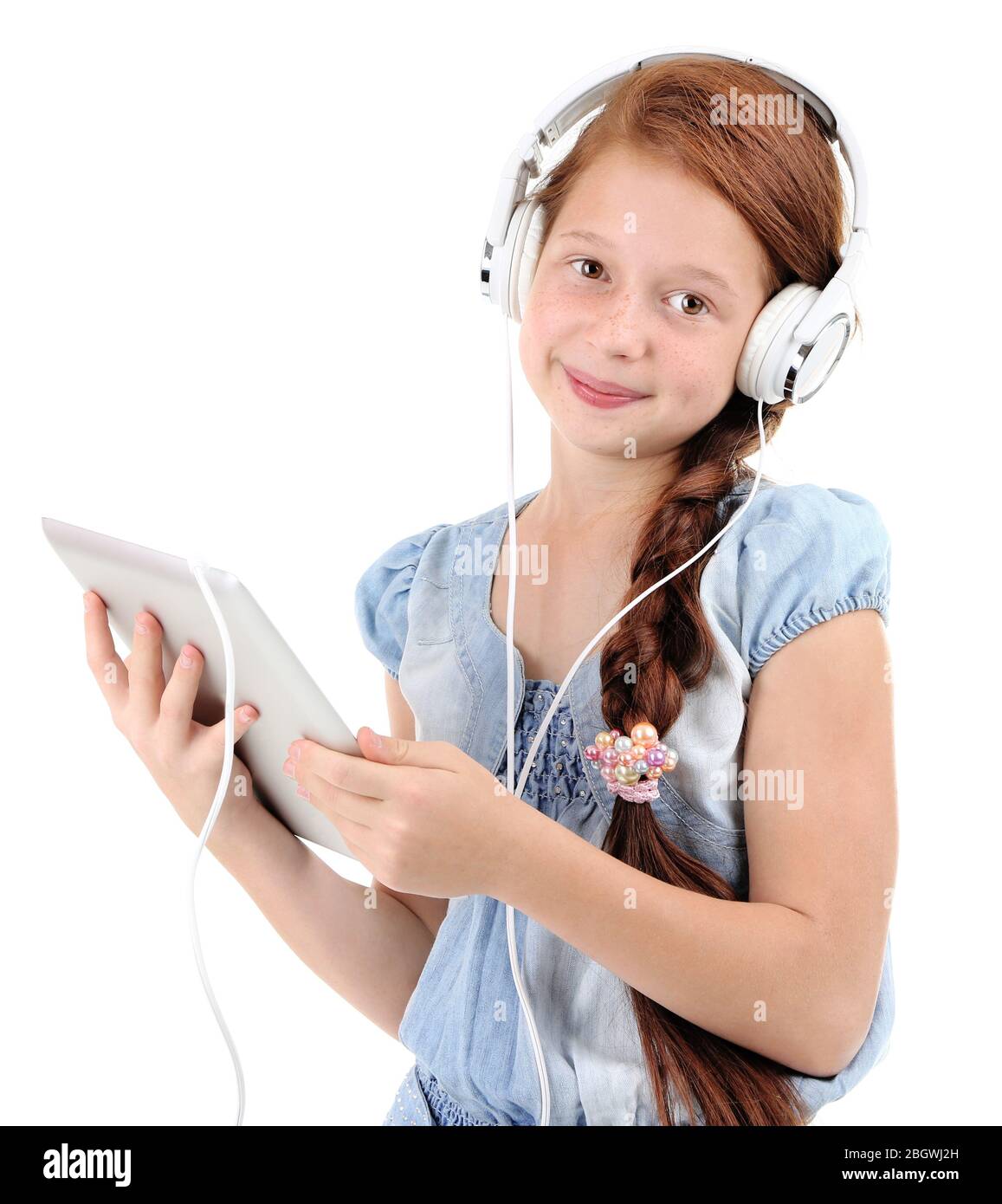 Beautiful little girl with tablet isolated on white Stock Photo - Alamy