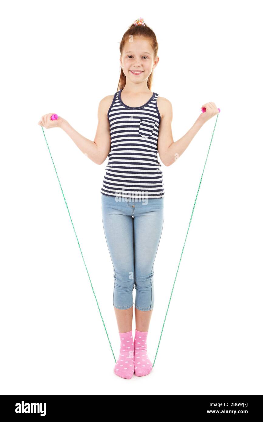 Beautiful little girl doing exercises isolated on white Stock Photo - Alamy