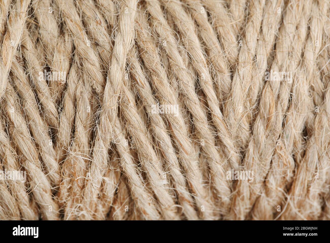 Texture of coil of coarse linen rope Stock Photo - Alamy