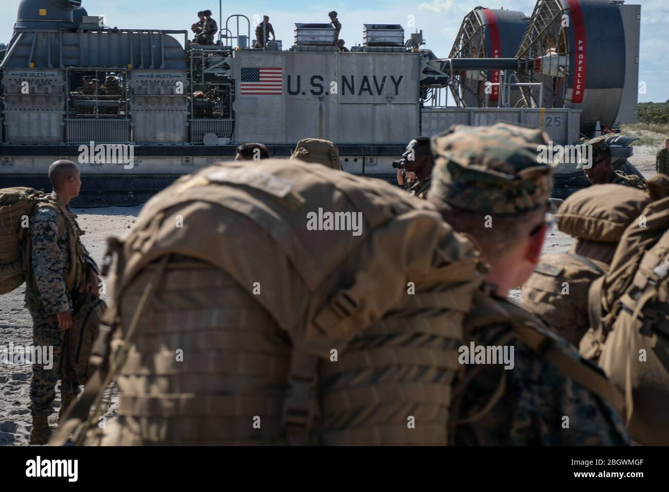 JACKSONVILLE, USA - OCTOBER 19: US navy Hovercraft behind US soldiers ...