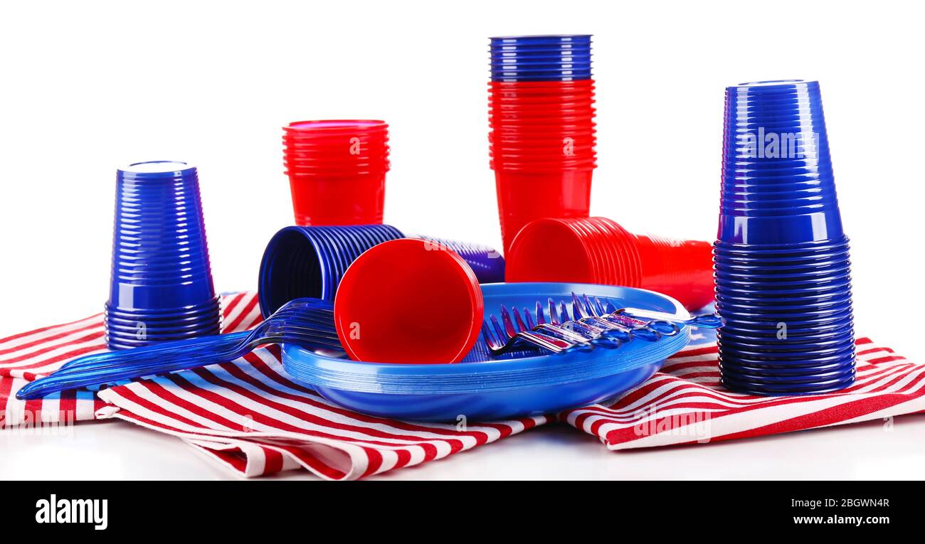 Bright plastic disposable tableware isolated on white Stock Photo - Alamy