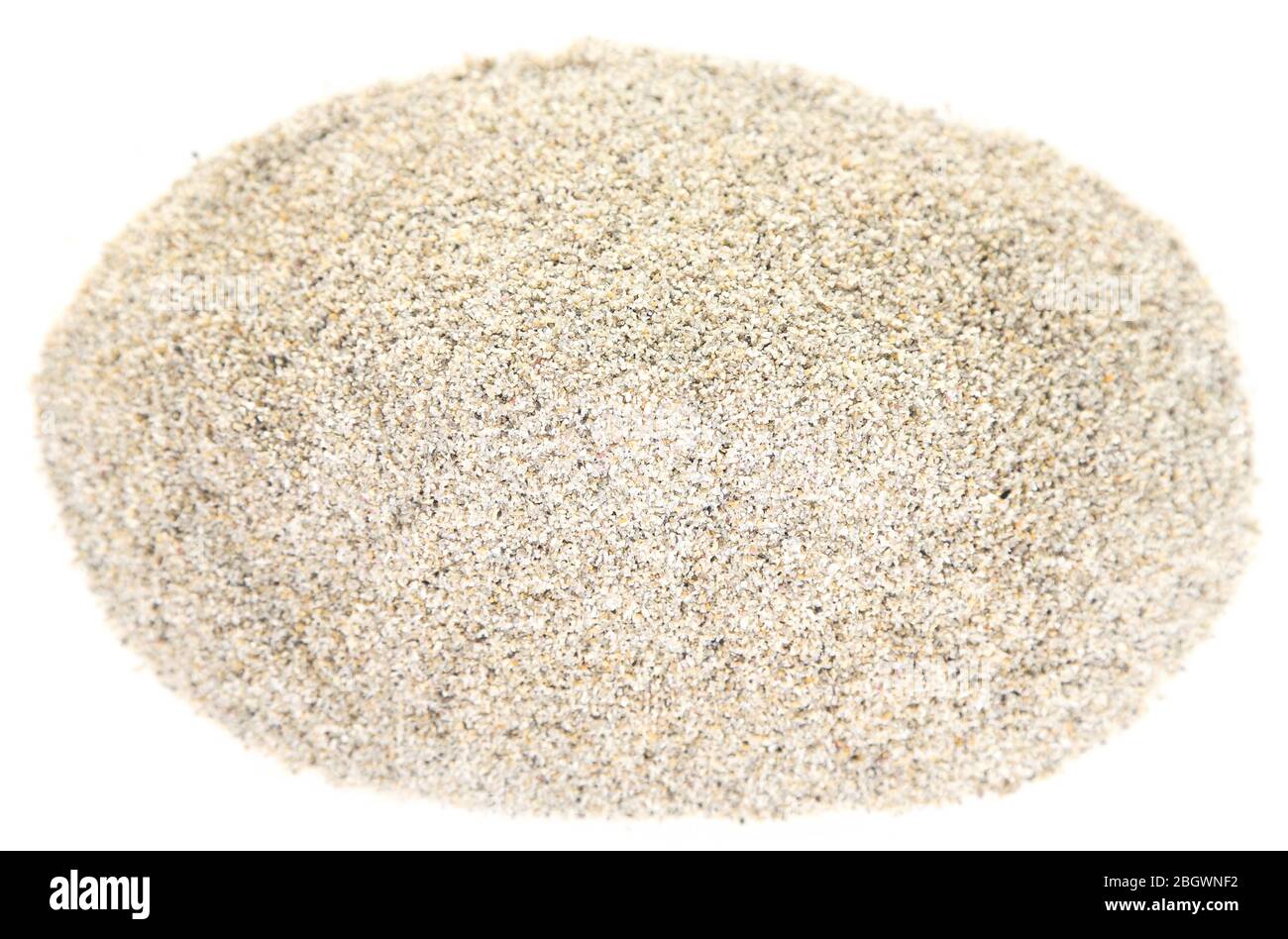 Heap of sea sand, isolated on white Stock Photo - Alamy