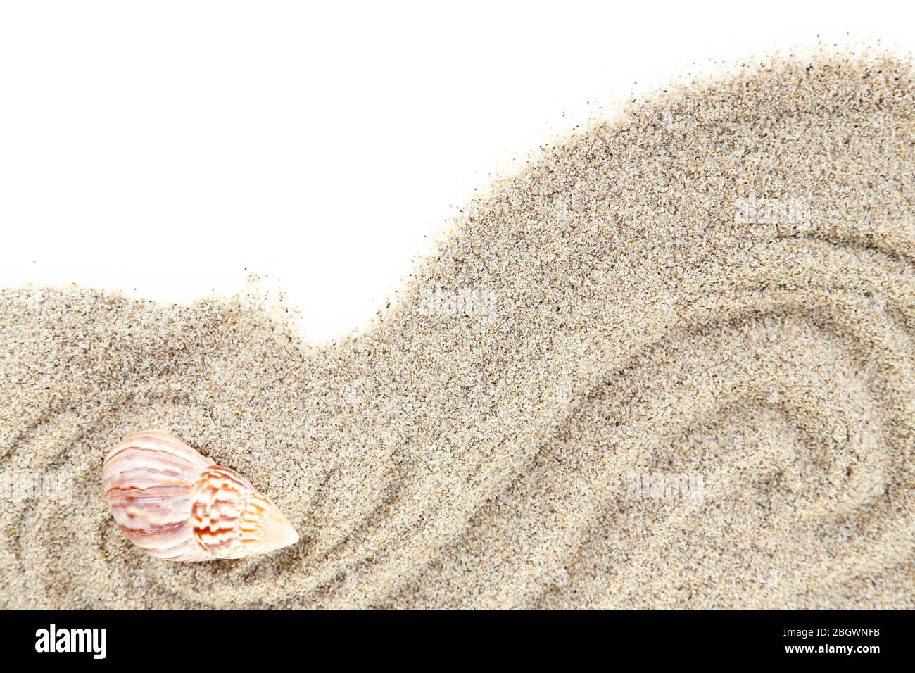 Heap of sea sand, isolated on white Stock Photo - Alamy
