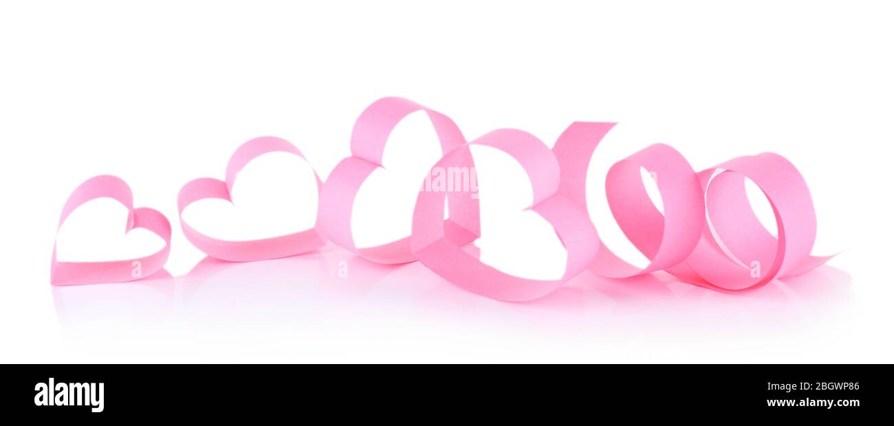 Heart shaped pink paper ribbon isolated on white Stock Photo - Alamy