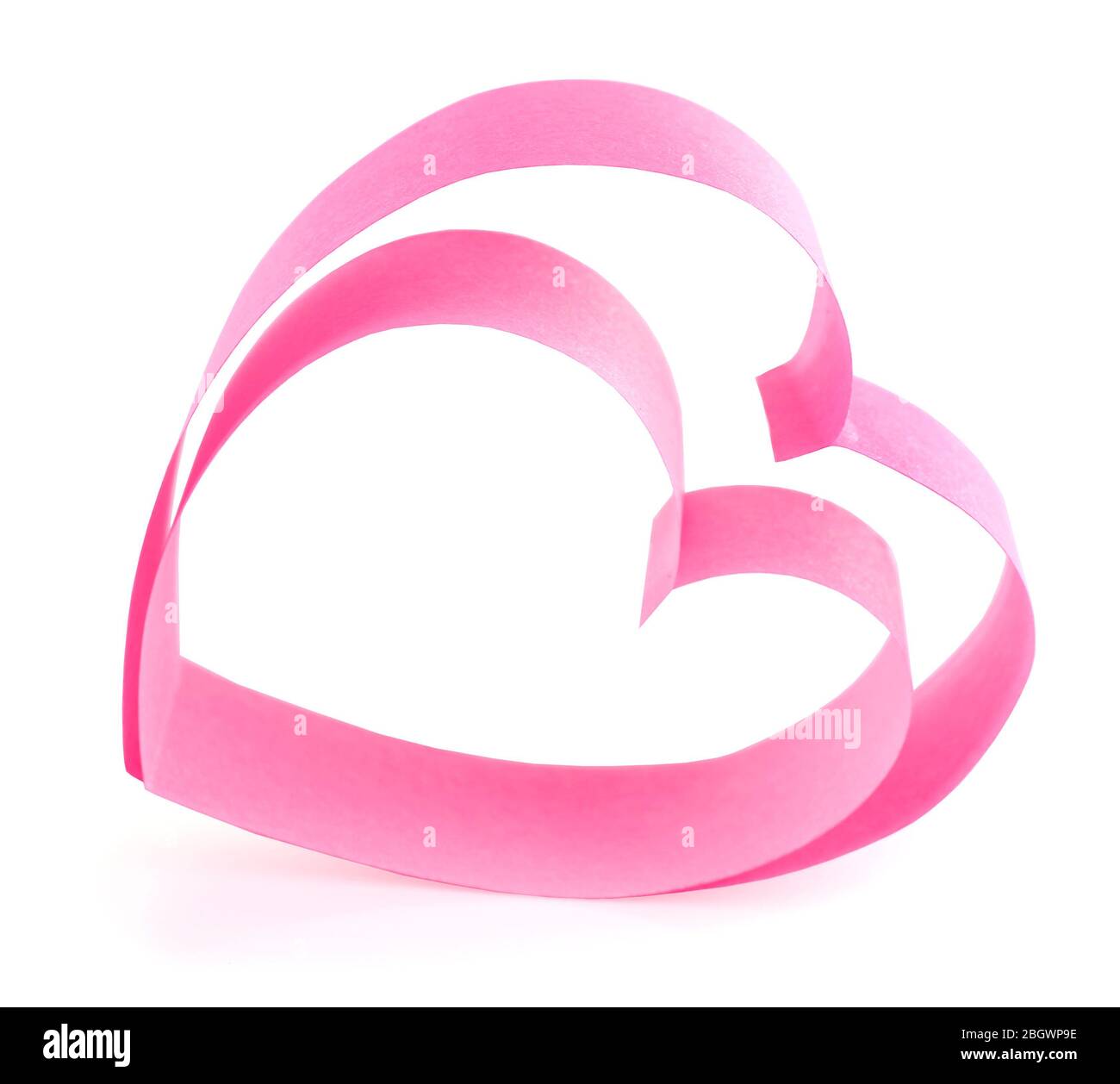 Heart shaped pink paper ribbon isolated on white Stock Photo - Alamy