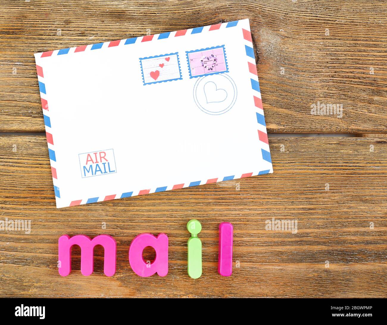 Mail word formed with colorful letters on wooden background Stock Photo ...