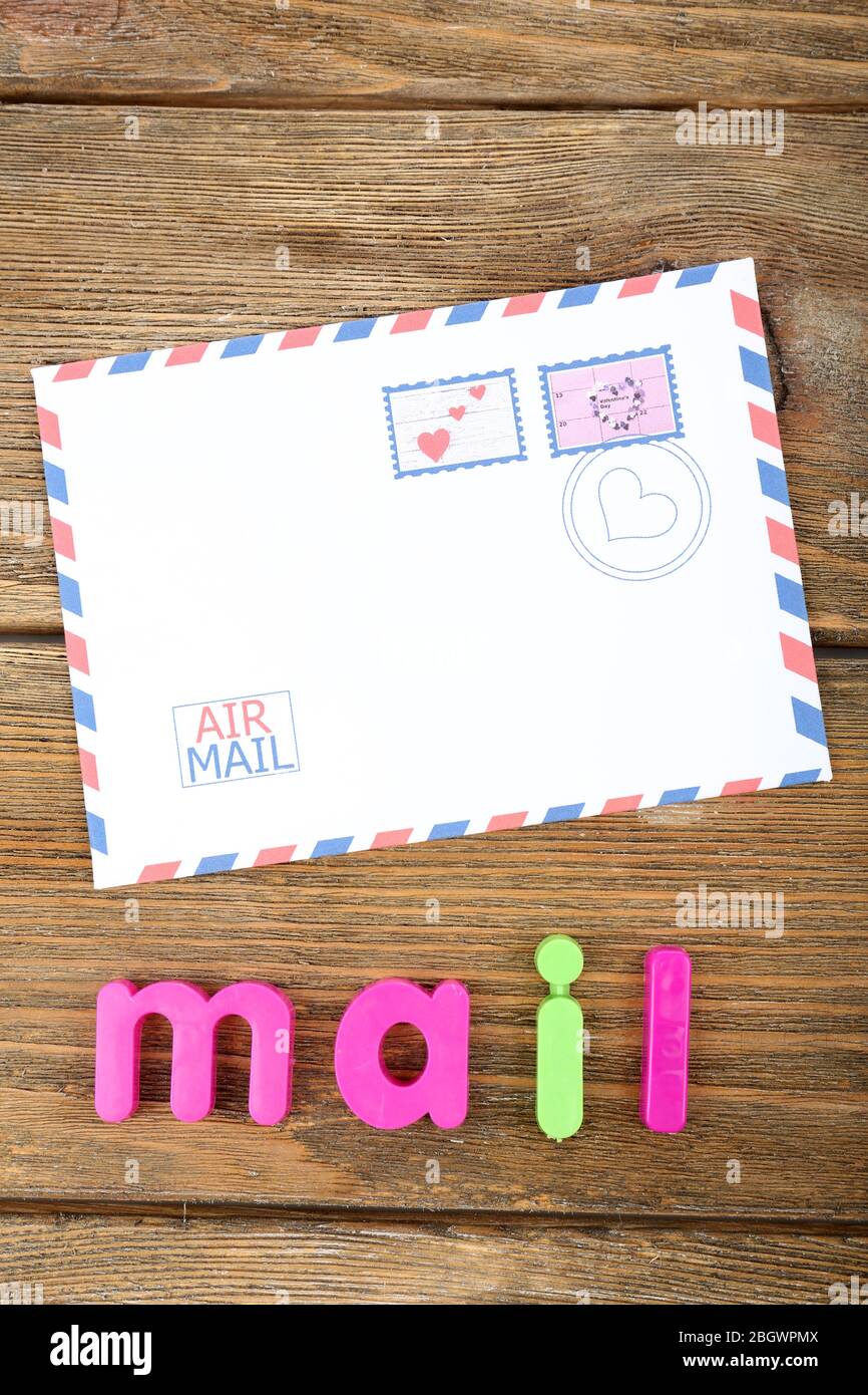 Mail word formed with colorful letters on wooden background Stock Photo ...