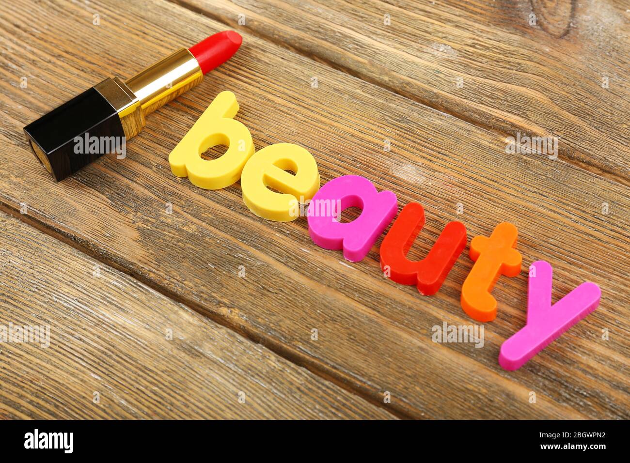 Beauty word formed with colorful letters on wooden background Stock ...
