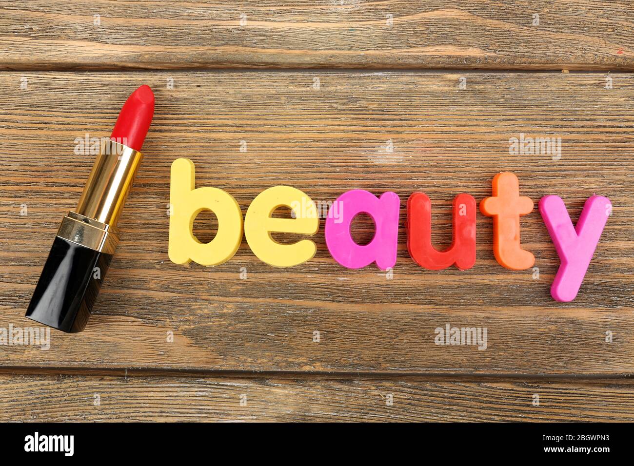 Beauty word formed with colorful letters on wooden background Stock ...