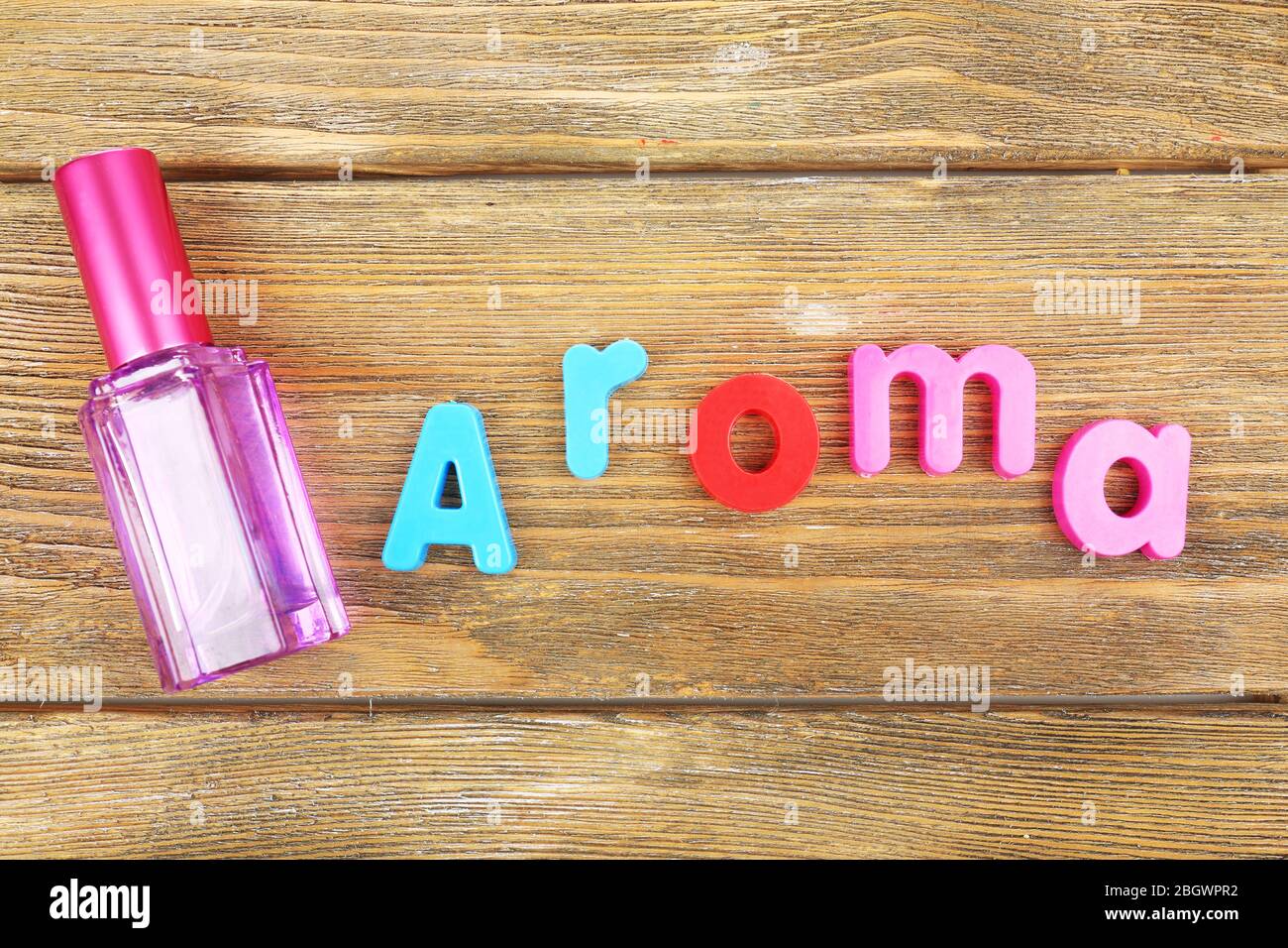 Aroma word formed with colorful letters on wooden background Stock ...