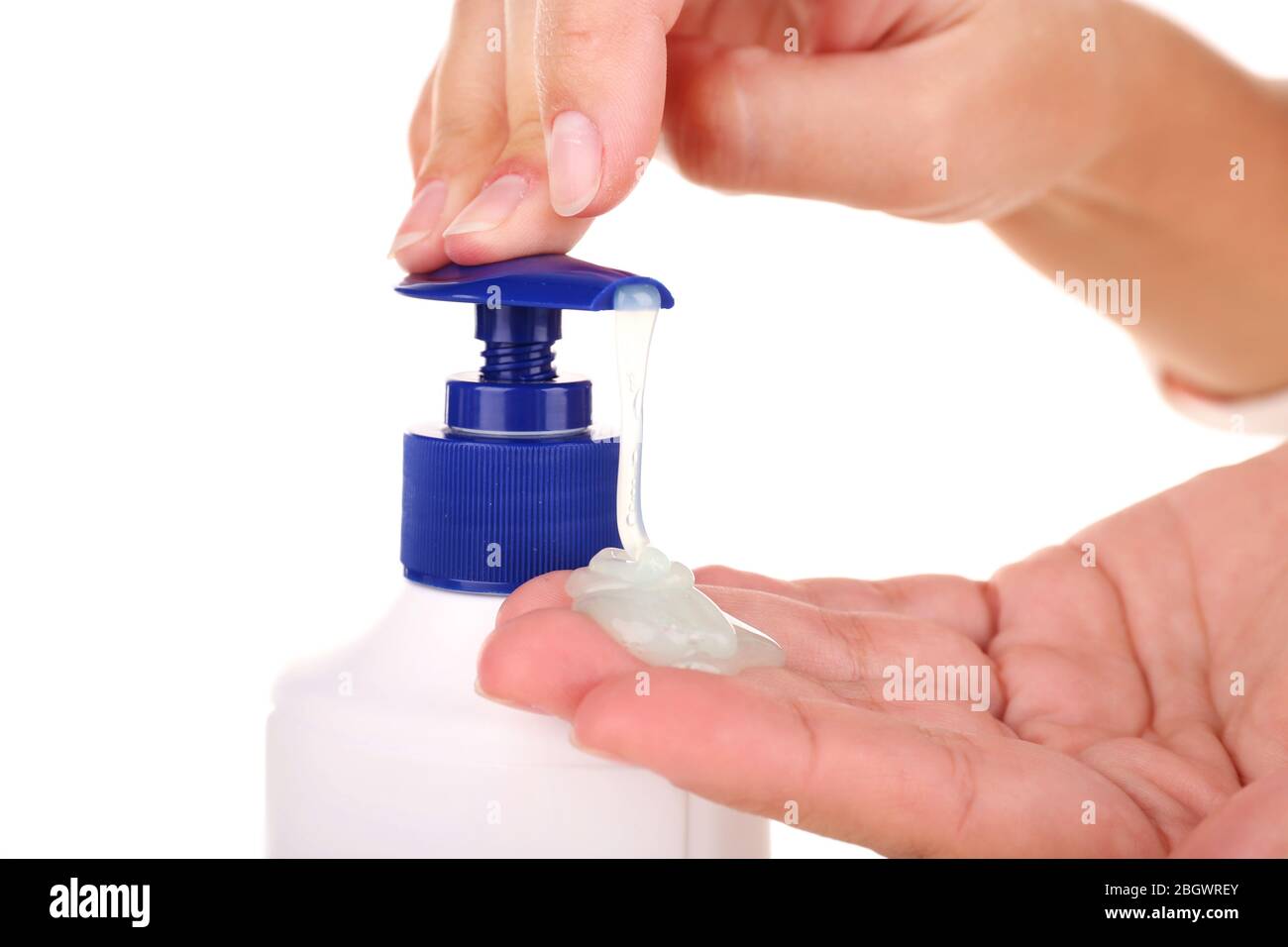 Female hands using liquid soap isolated on white Stock Photo - Alamy