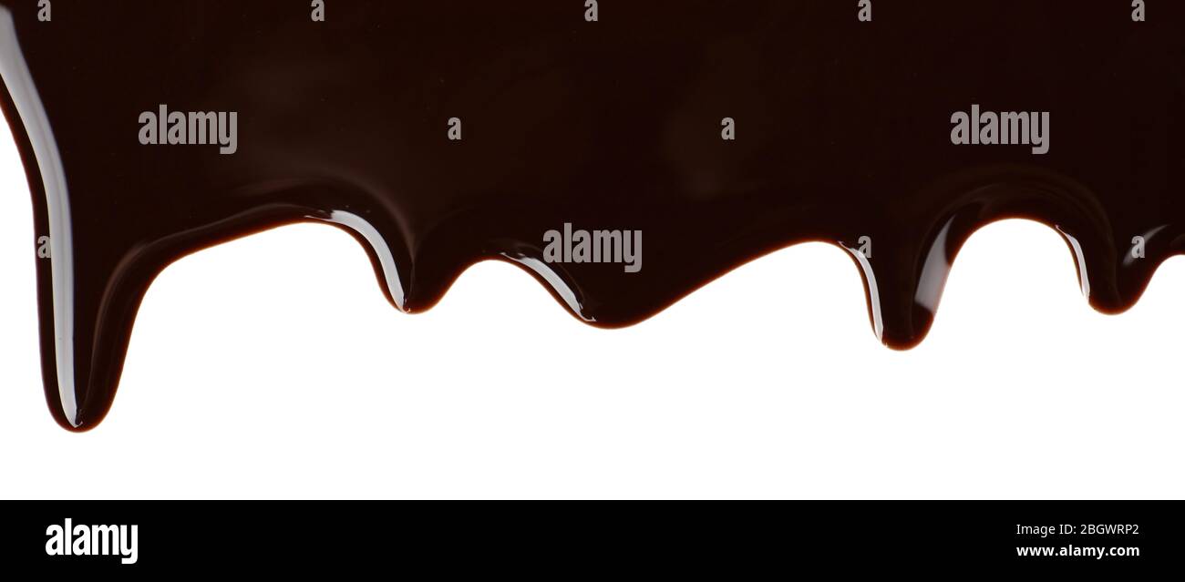 Melted chocolate dripping on white background Stock Photo - Alamy