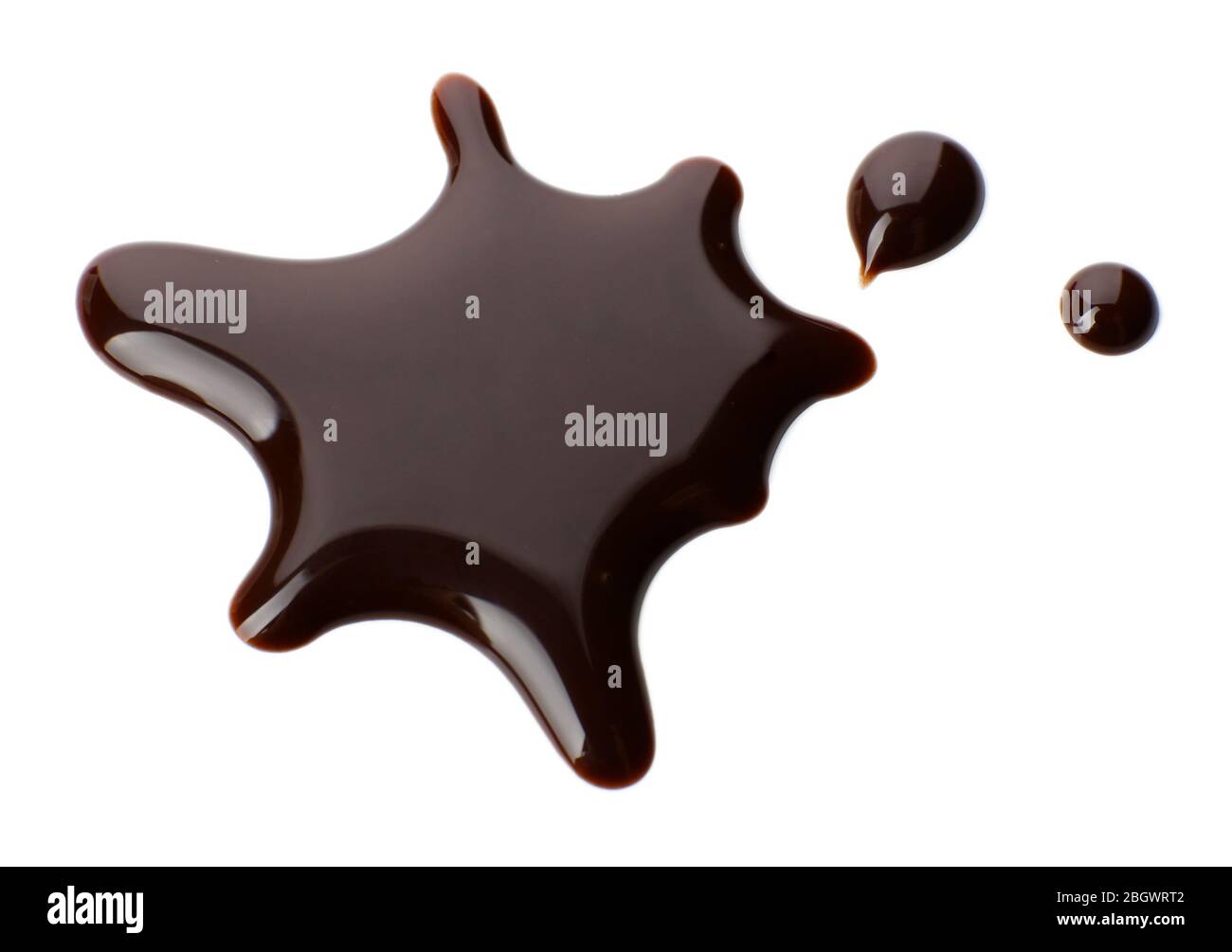 Chocolate syrup drips isolated on white Stock Photo - Alamy