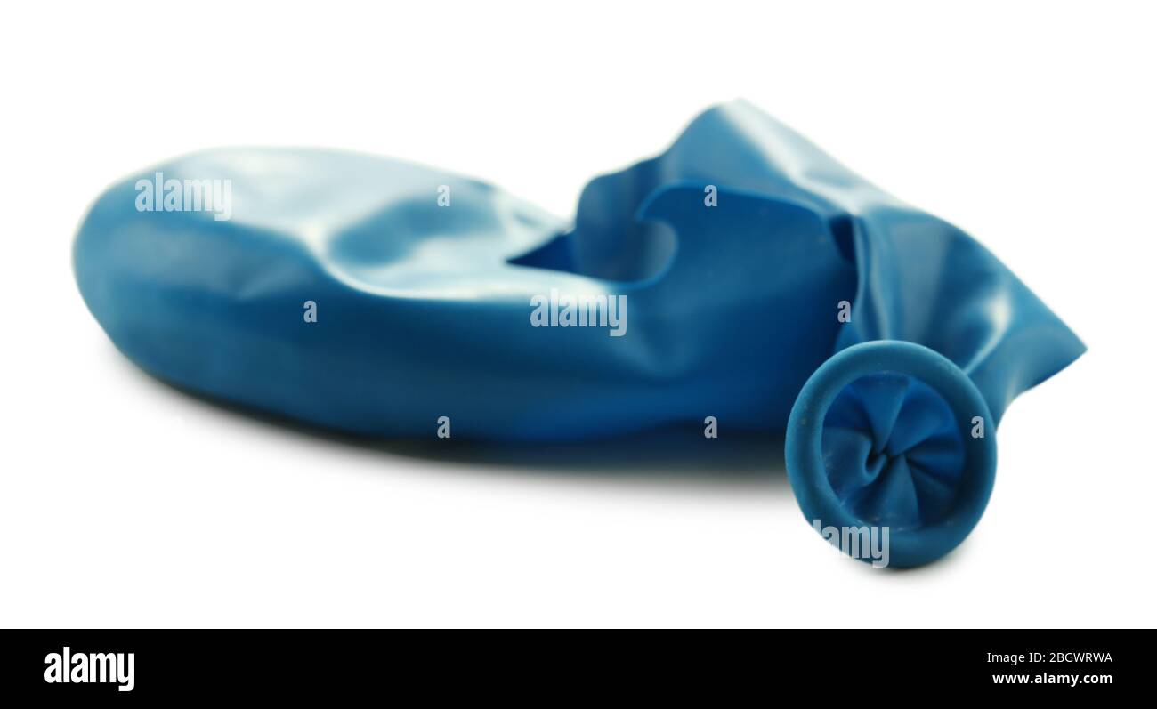 Popped blue balloon isolated on white Stock Photo - Alamy