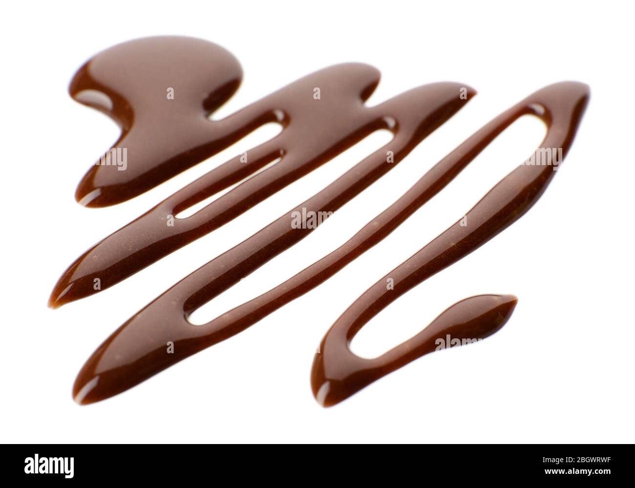 Chocolate syrup drips in shape of light bulb isolated on white Stock ...